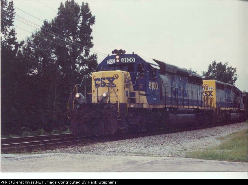 A summer 2006 multiple meet--CSX 8100 leads A746 into West Point. With all the northbounds now ...